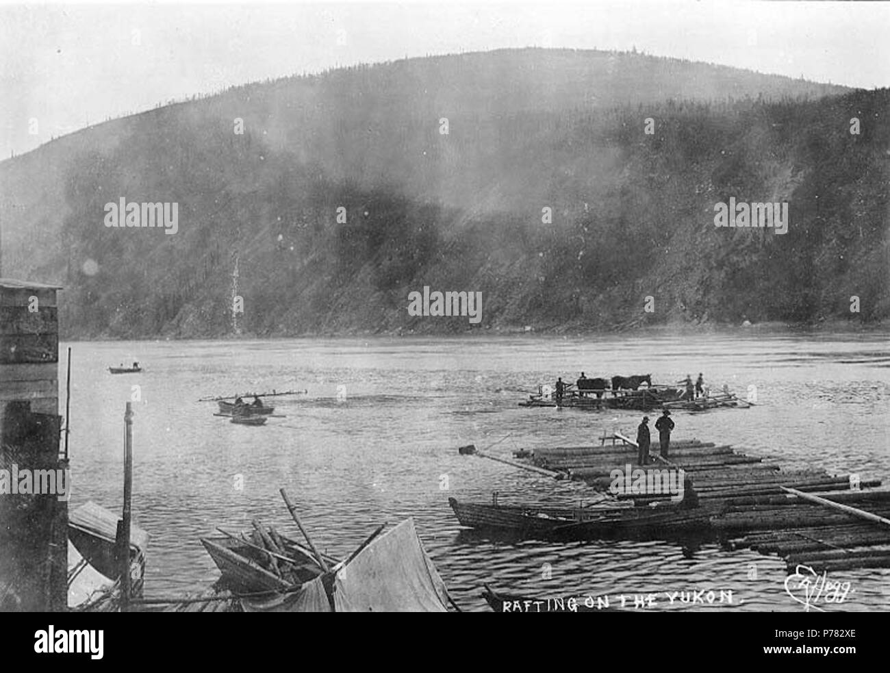 . English: Rafting on the Yukon River, Yukon Territory, ca. 1898 ...
