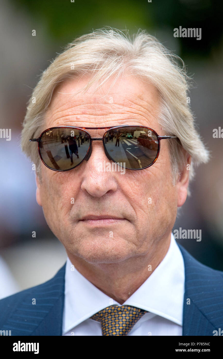 Rupert Martin leaves the High Court in London where Court of Appeal ...