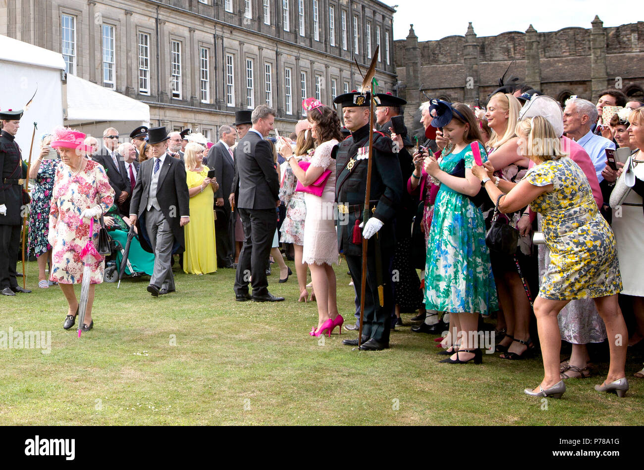 Queen Elizabeth II during a garden party at the Palace of Holyroodhouse ...