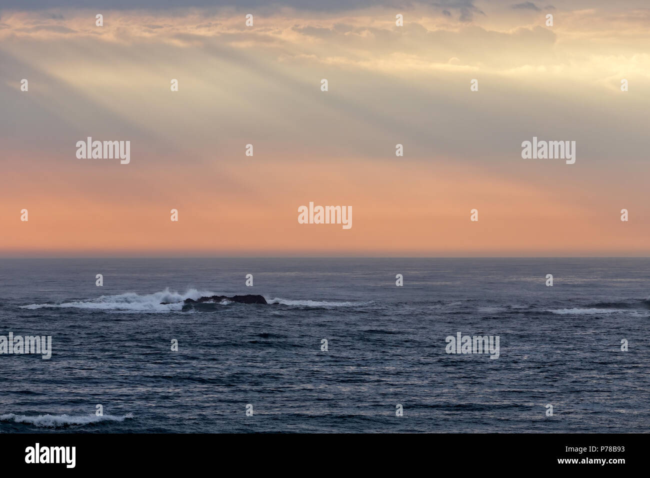 Sun rays over portuguese coast at sunset. North of Portugal Stock Photo ...