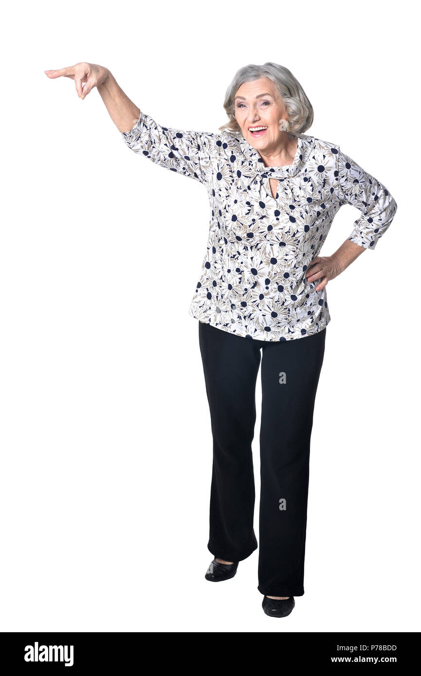 happy senior woman pointing isolated Stock Photo - Alamy