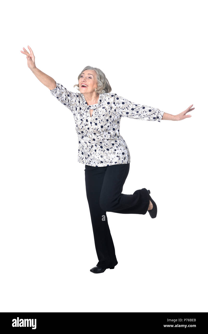 happy senior woman dancing isolated Stock Photo - Alamy