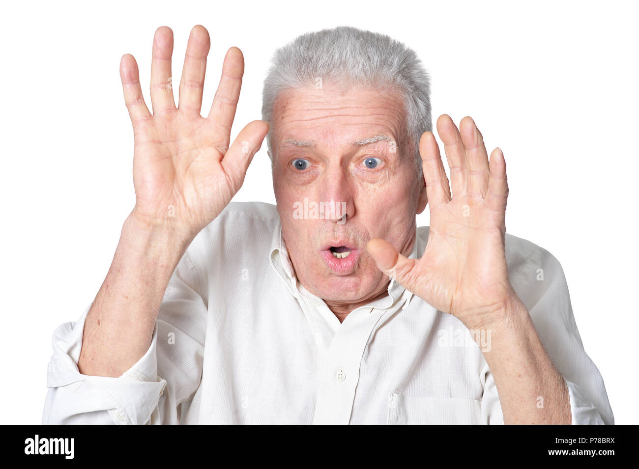 Surprised senior man posing hi-res stock photography and images - Alamy