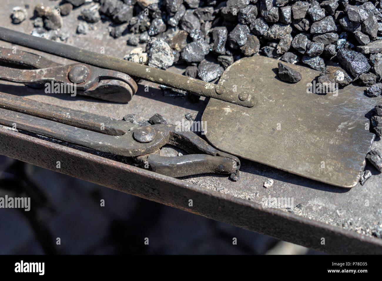 Pliers for the embers and shovel for the coal from a medieval forge ...