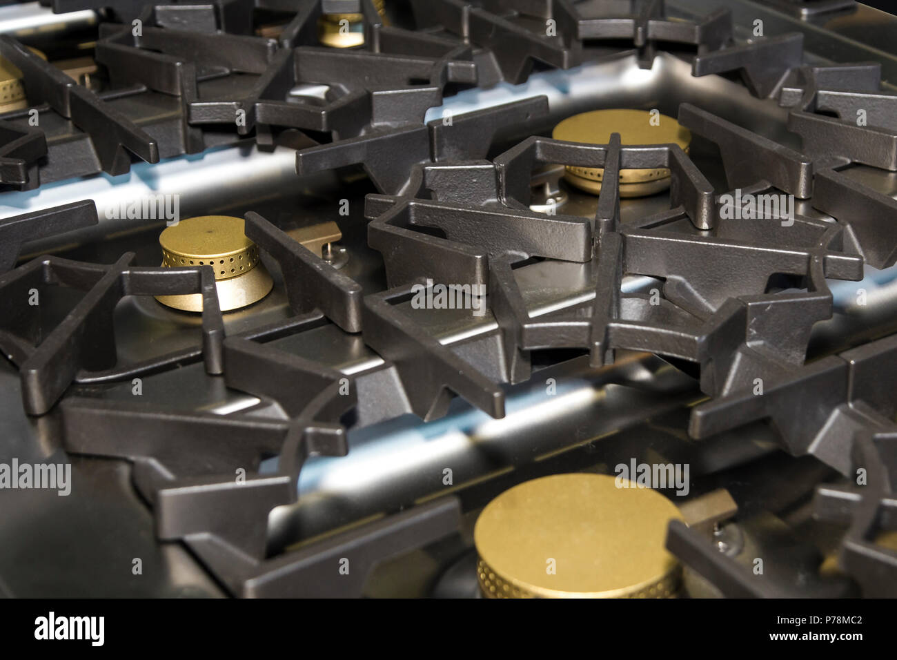 black gas stove top view close-up, background image Stock Photo - Alamy