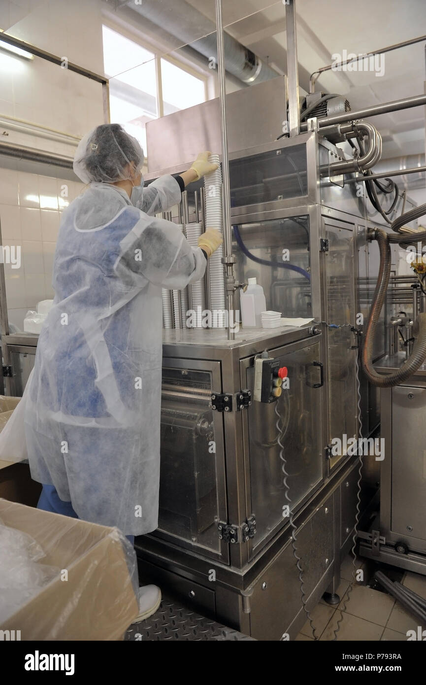 Dairy plant milk packing equipment hi-res stock photography and images ...
