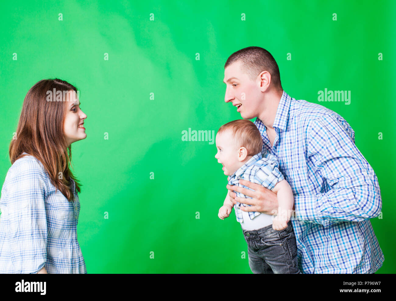 Flying baby between parents Stock Photo - Alamy