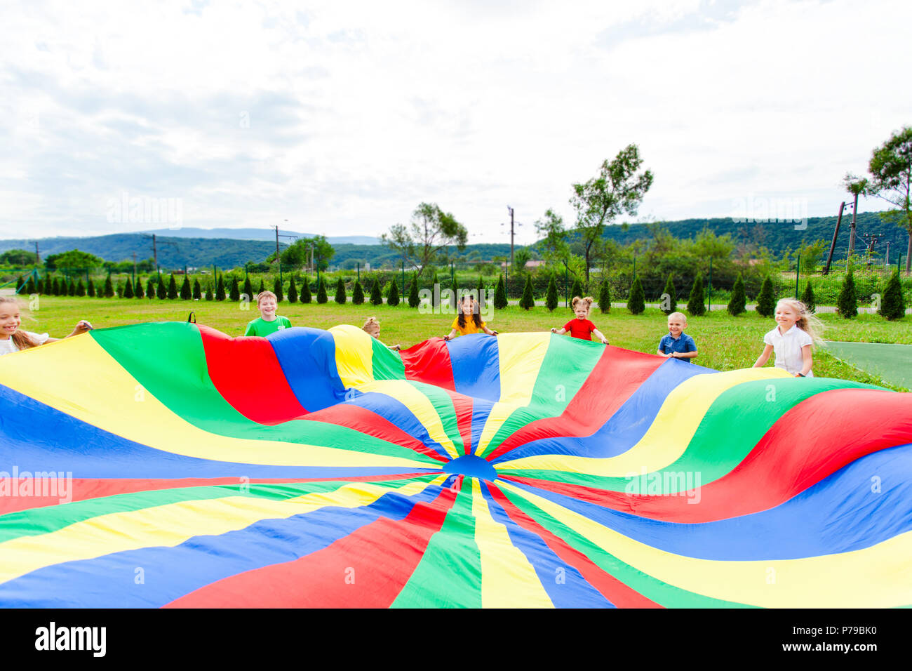 Kindergarten parachute hi-res stock photography and images - Alamy