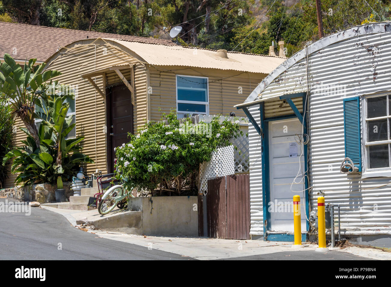 Vintage Quonset hut tiny home building, corrugated metal weathered old ...