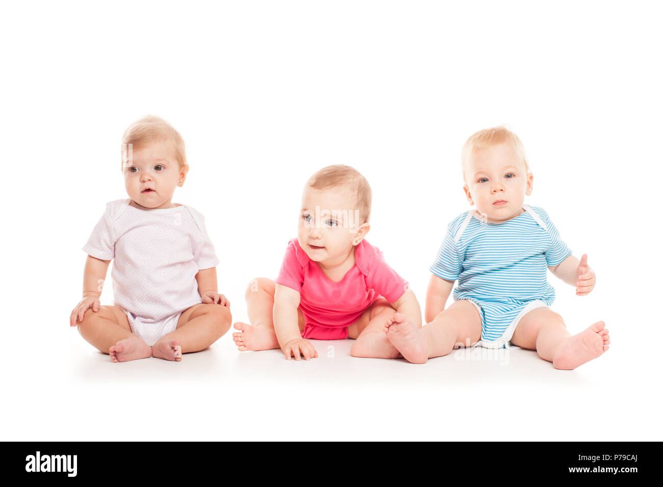 Group of three babies Stock Photo - Alamy