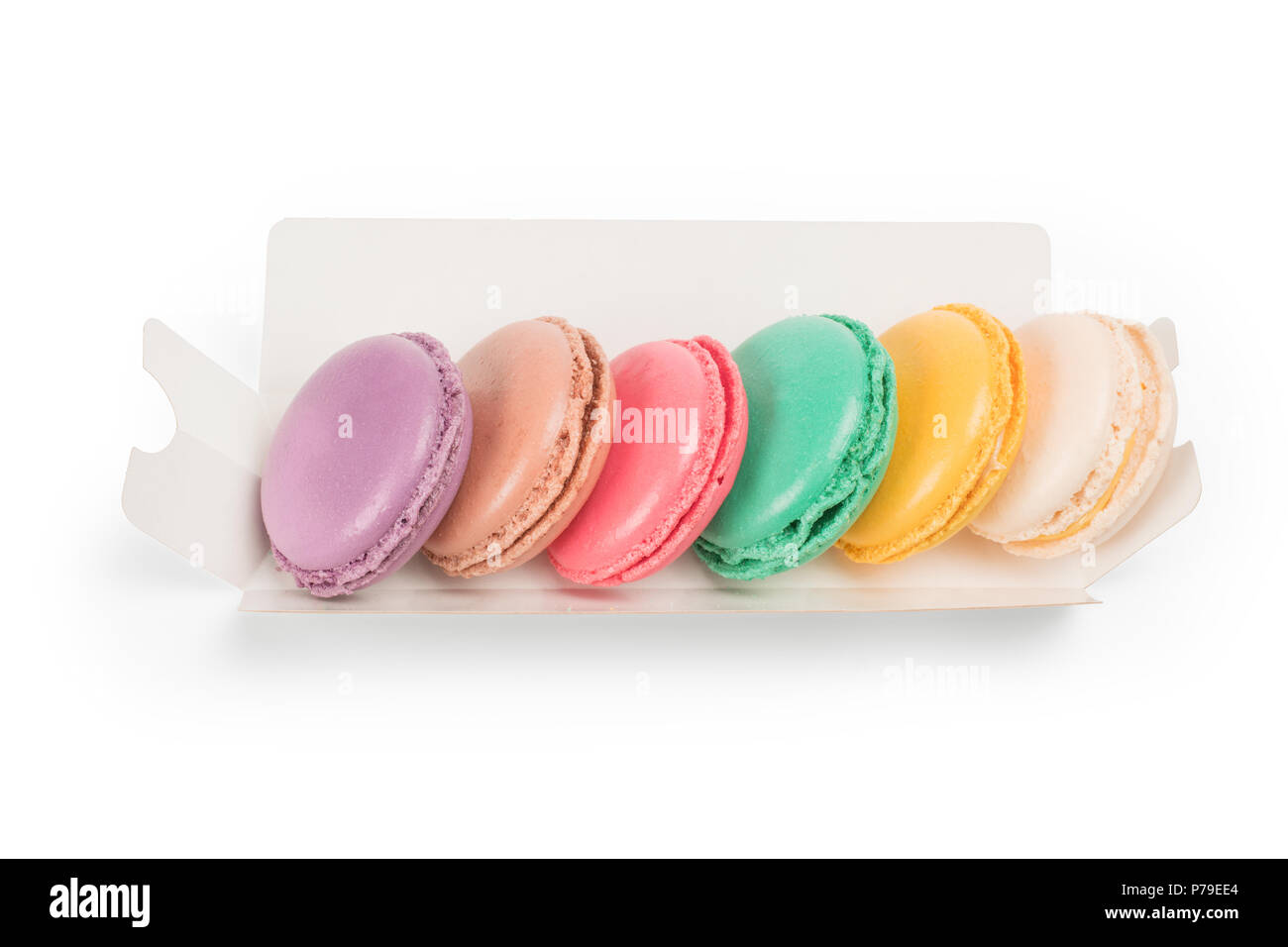 Colored macaroons pack in white cardboard box. Isolated on white ...