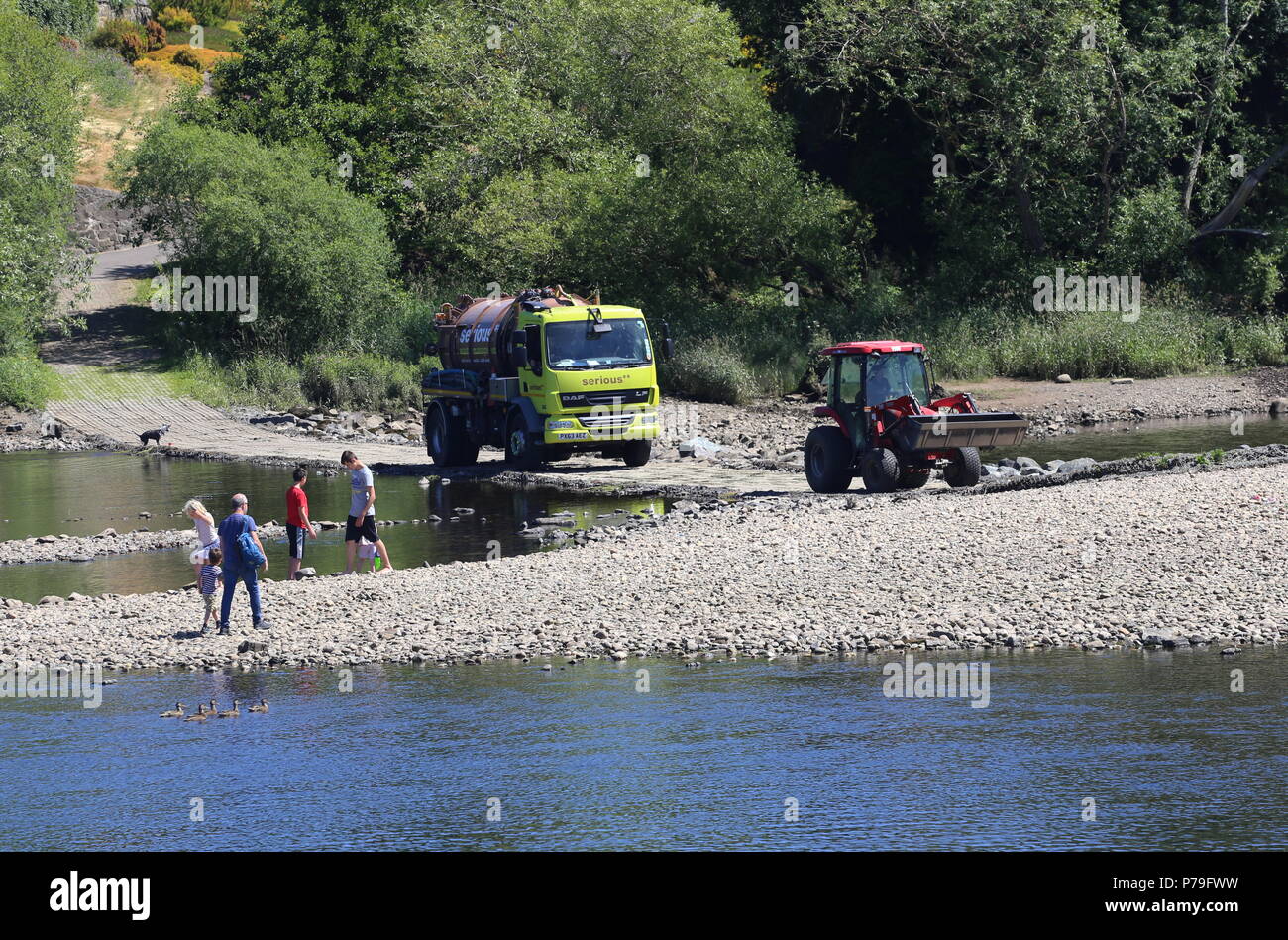 Vehicles crossing causeway across River Tay to Friarton Island Perth ...