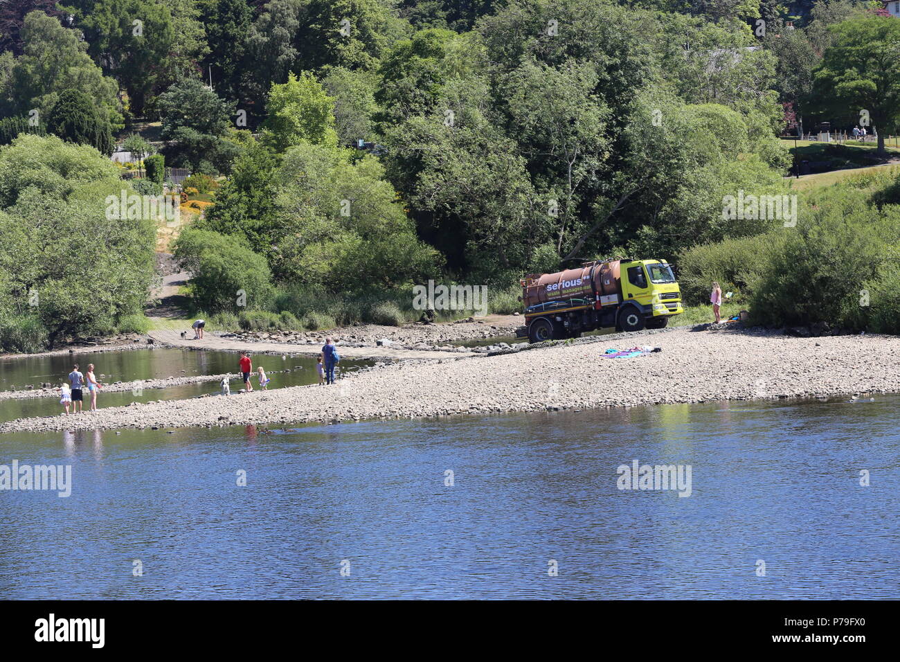 Vehicles crossing causeway across River Tay to Friarton Island Perth ...