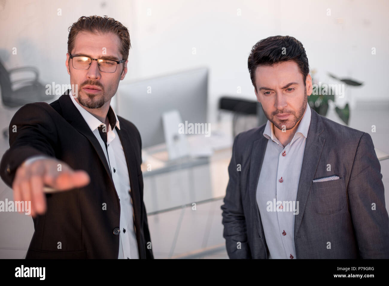 close up.businessman talking to future partner Stock Photo - Alamy