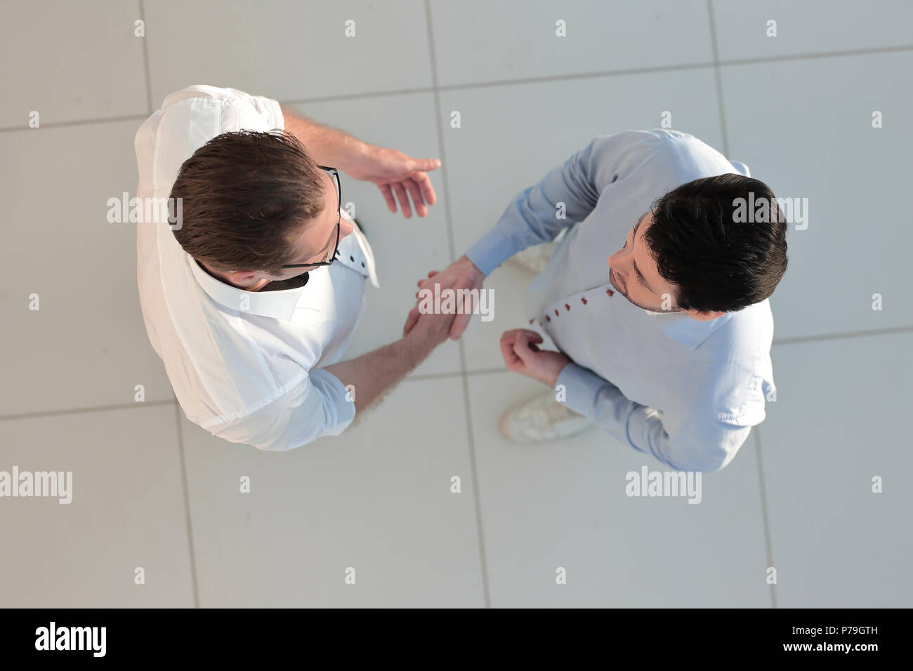 top view. handshake of modern business people Stock Photo - Alamy