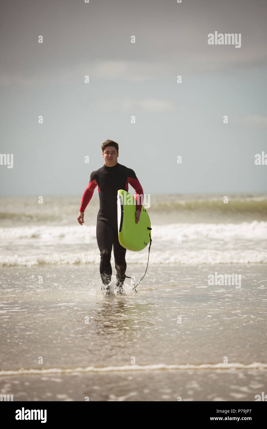 Surfer surfboard running on hi-res stock photography and images - Alamy