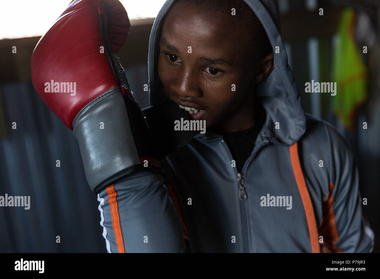 Male boxer practicing boxing in fitness studio Stock Photo - Alamy