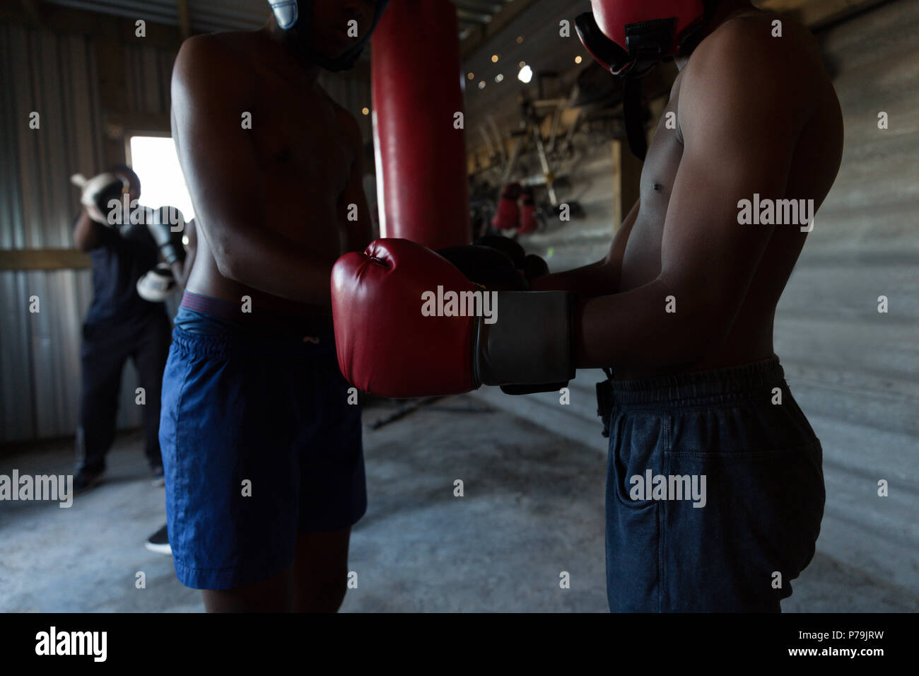 Trainer helping boxer hi-res stock photography and images - Alamy