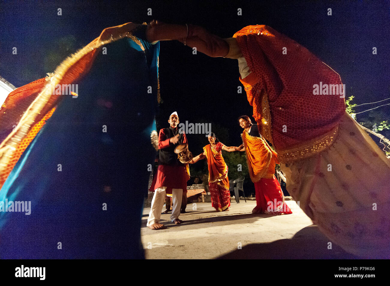 Group of indian womans wearing traditional kumaoni saris performing a ...
