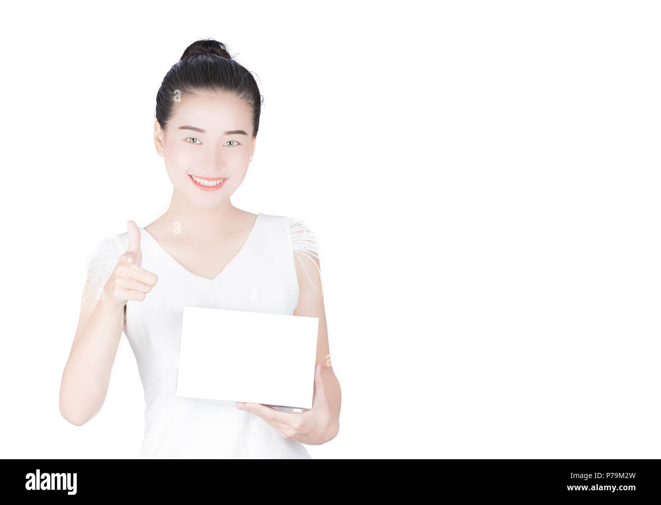 Woman holds the product for presentation. Lady beautiful in white shirt ...