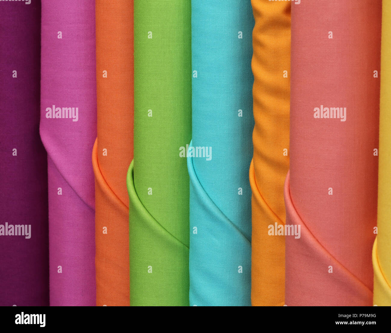 Many fabrics of various colored fabrics in the artisan tailor's shop ...