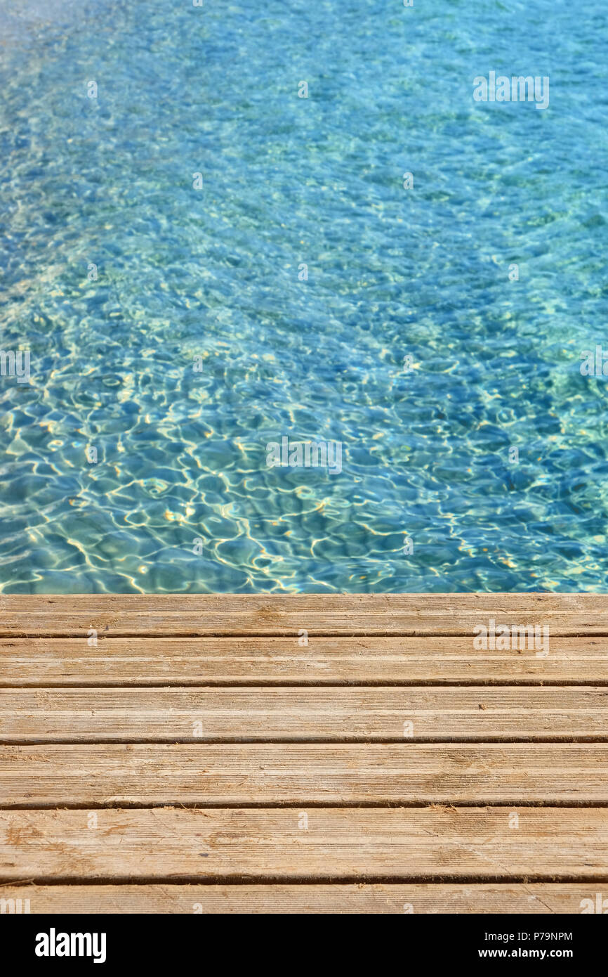 Ocean with wood boardwalk deck Stock Photo - Alamy