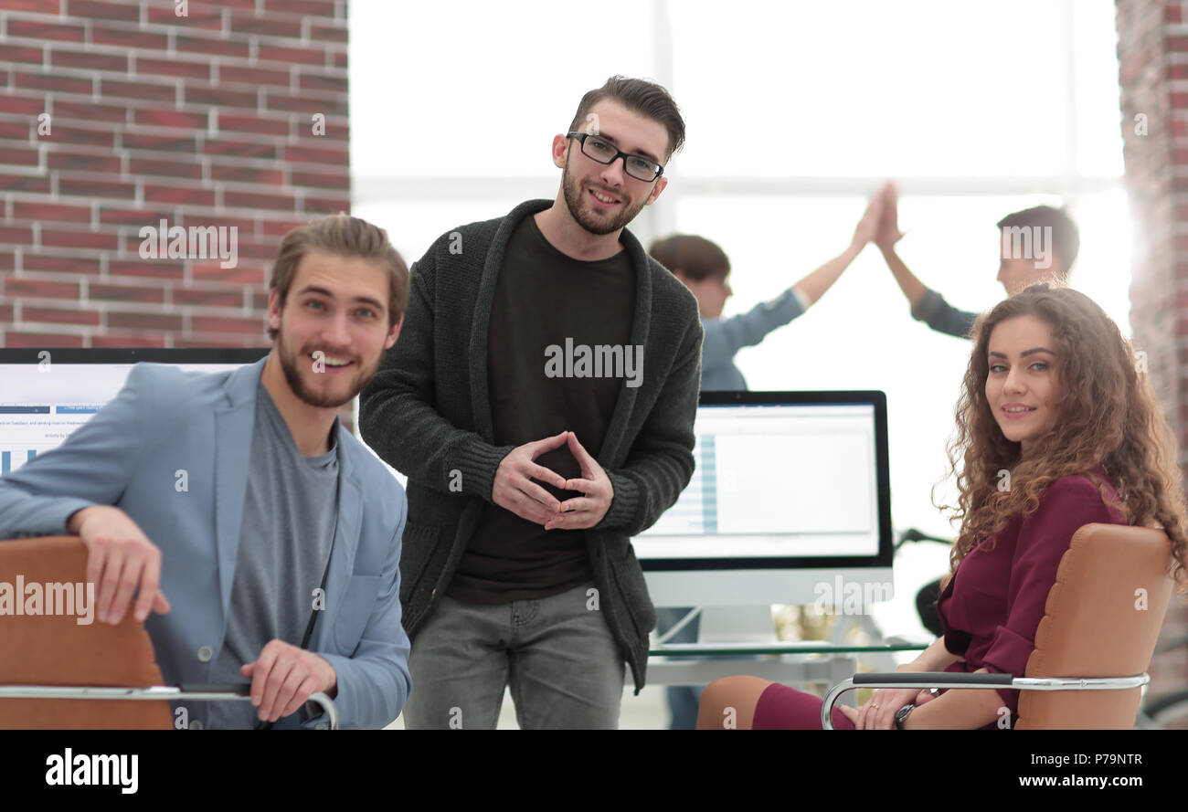 cheerful colleagues in the workplace Stock Photo - Alamy