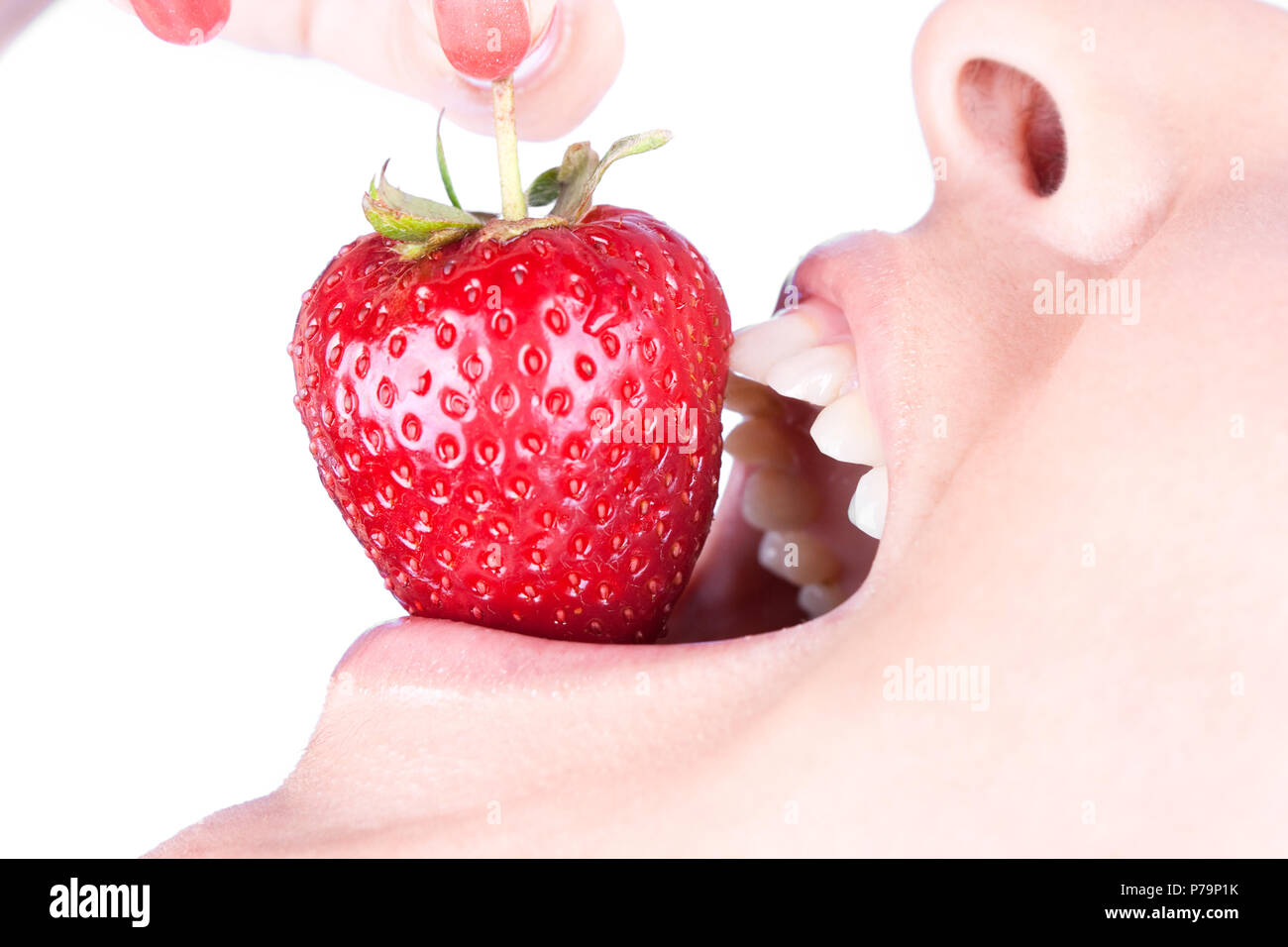 Person looking at strawberry hi-res stock photography and images - Alamy