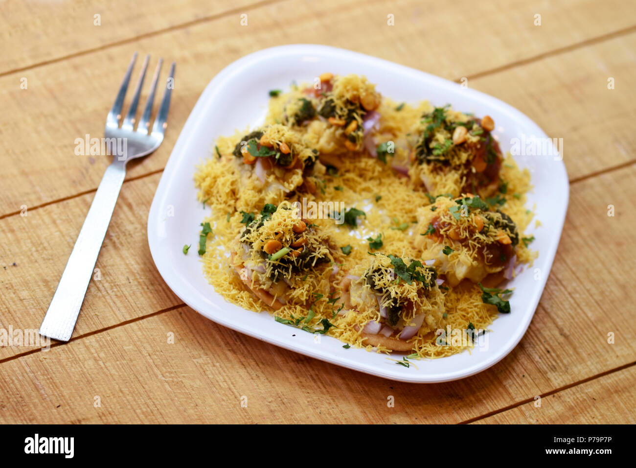 Sev Batata Puri - popular indian snacks or street food Stock Photo - Alamy