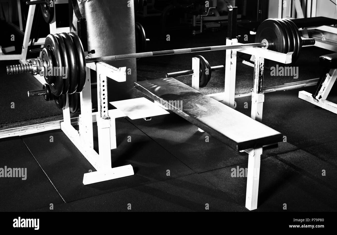 weight in dark weight room, black-and-white horizontal photo Stock ...