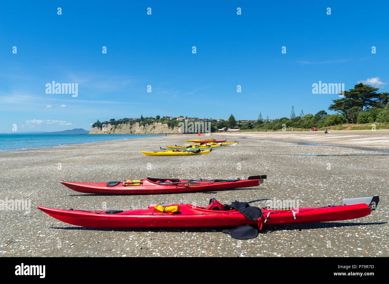 Kayaks parking along the Long Bay Beach Park in Auckland,New Zealand ...