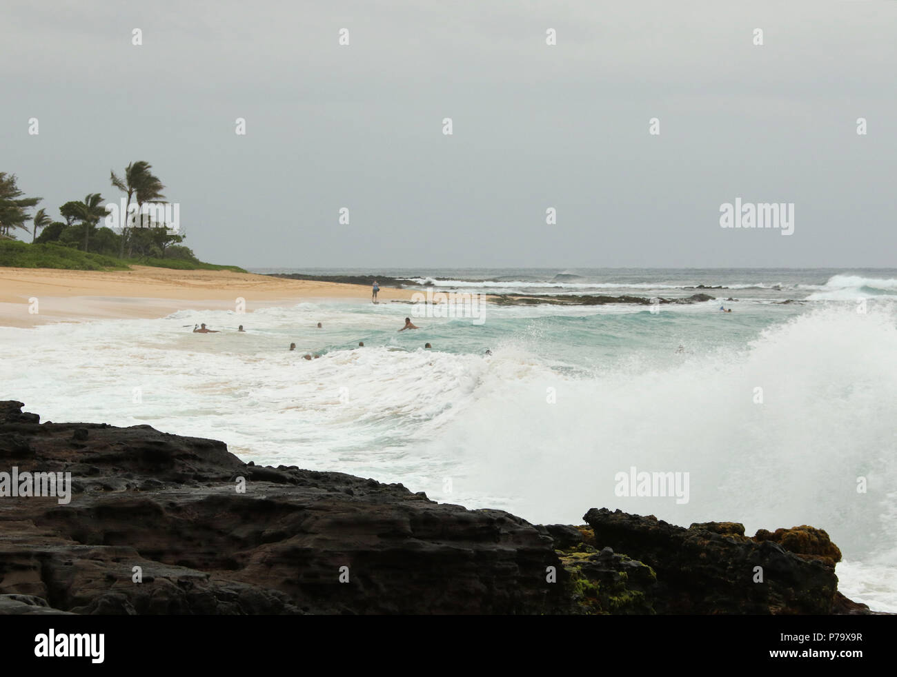 Sandy Beach with surfers and swimmers. Sandy Beach, Halona Cove, Oahu ...