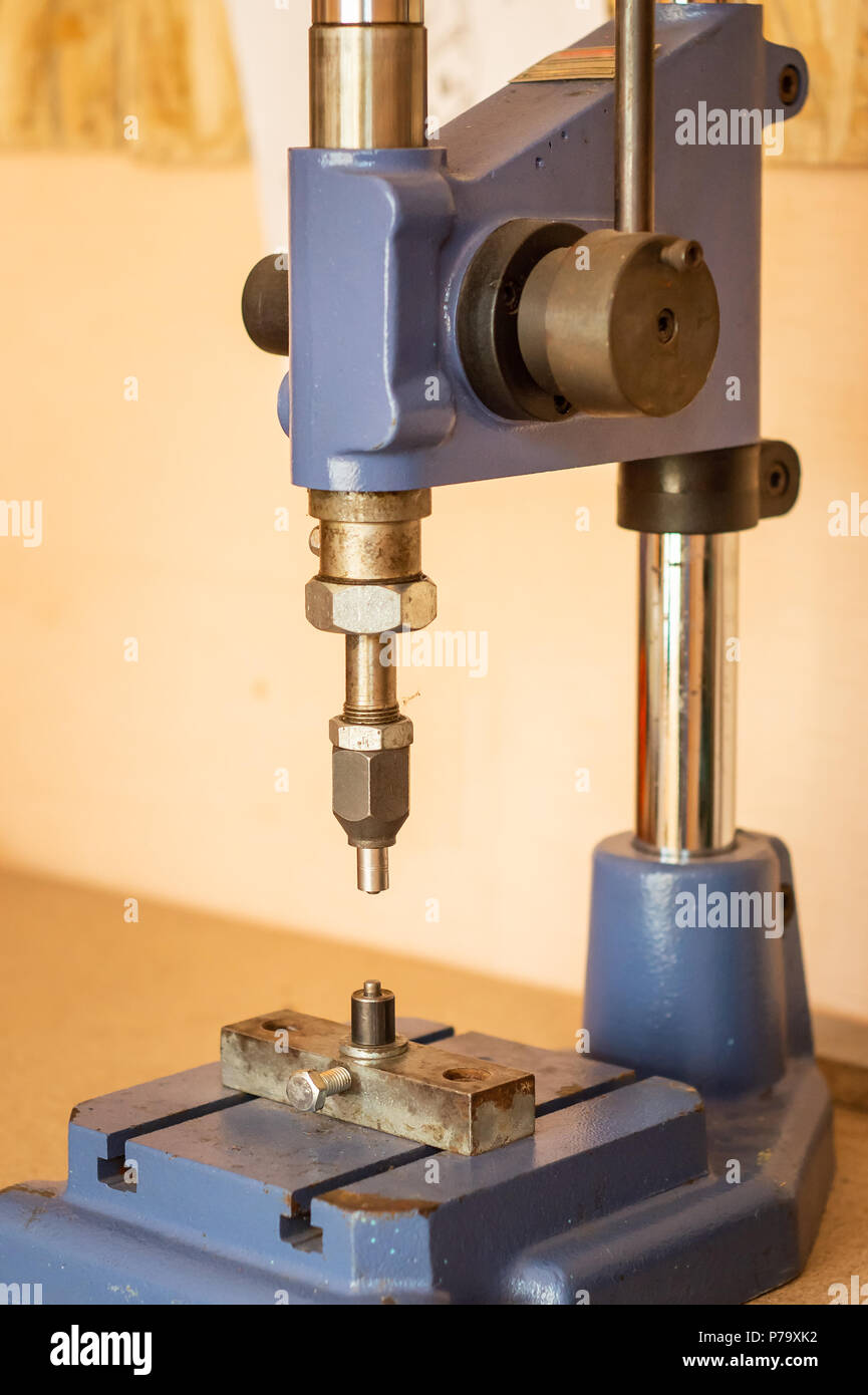 Grommet machine hi-res stock photography and images - Alamy