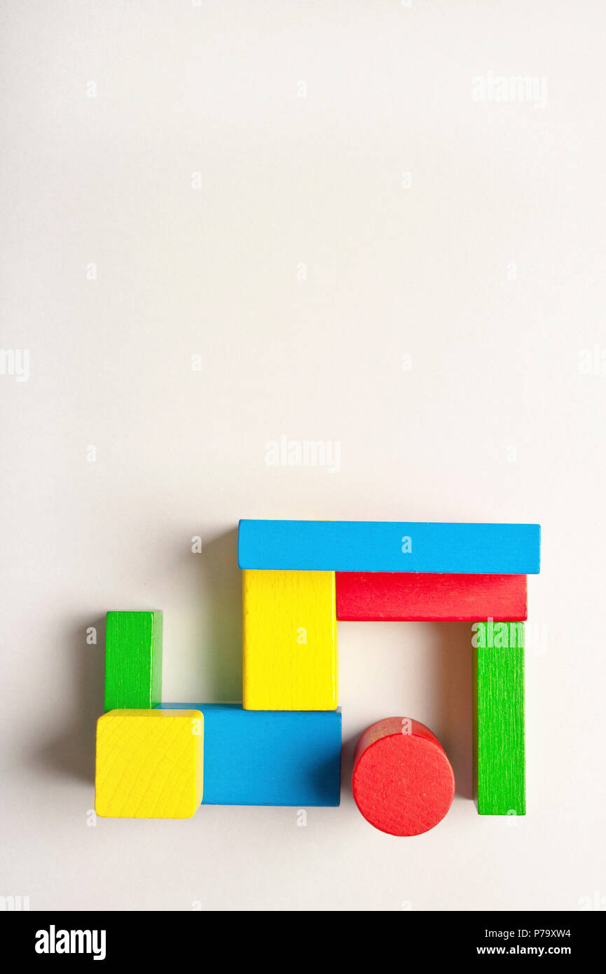 colorful wooden toy construction blocks Stock Photo - Alamy