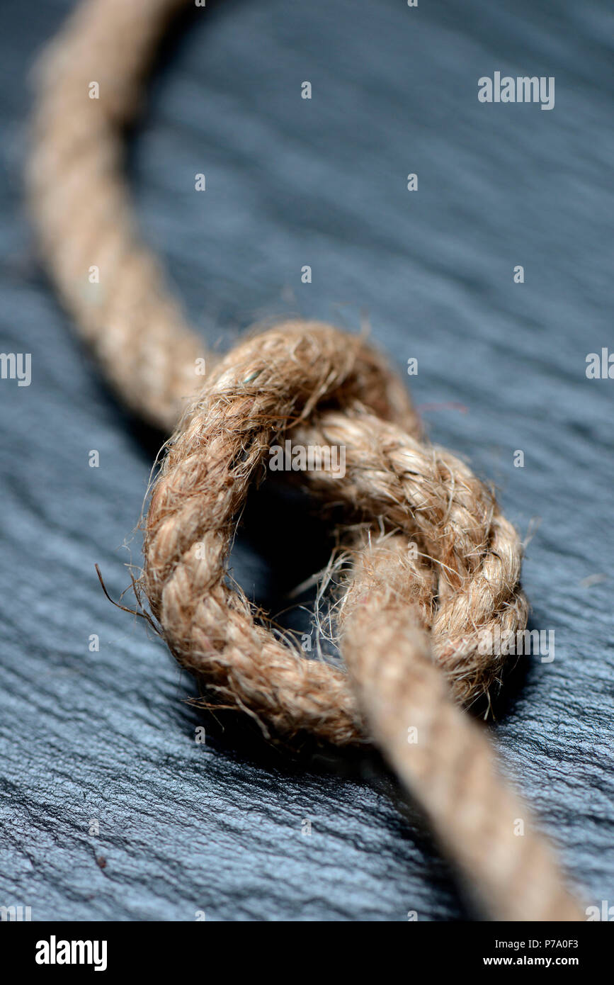 knot in jute rope Stock Photo - Alamy