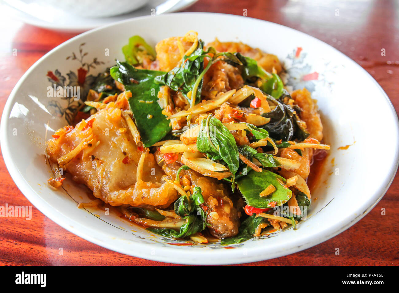 Stir fried spicy cat fish ,Thai food Stock Photo - Alamy