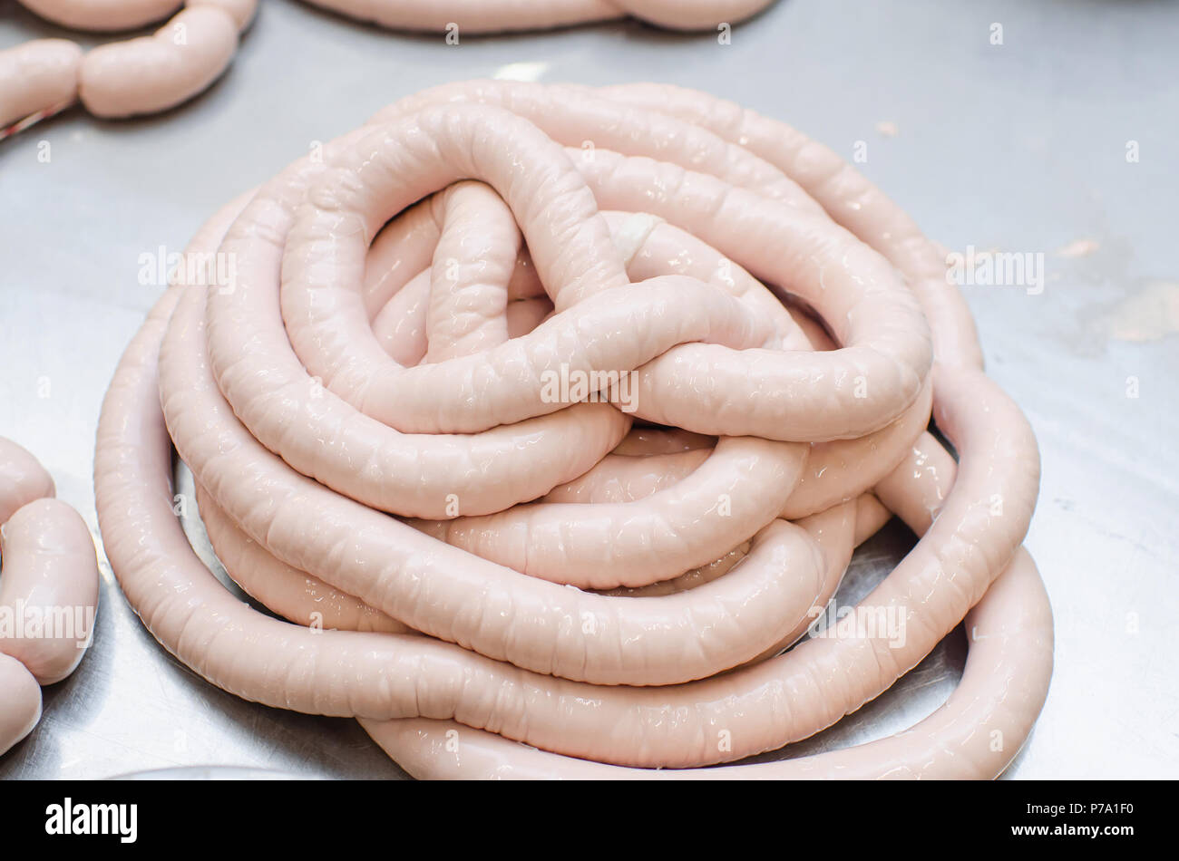Sausage. Sausage production line. Process of sausage manufacturing ...