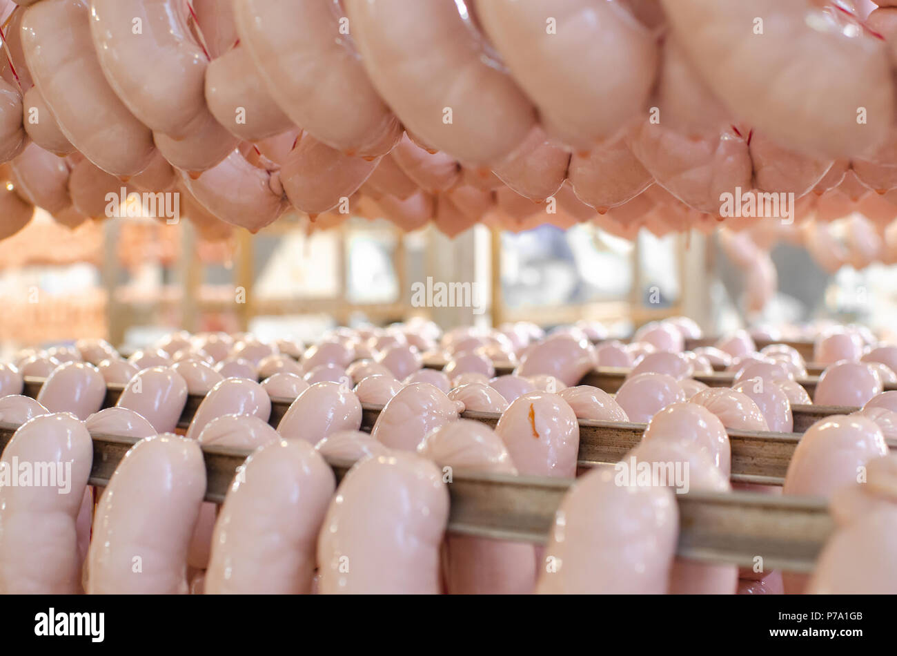 Sausage. Sausage production line. Sausage on the counter for the ...