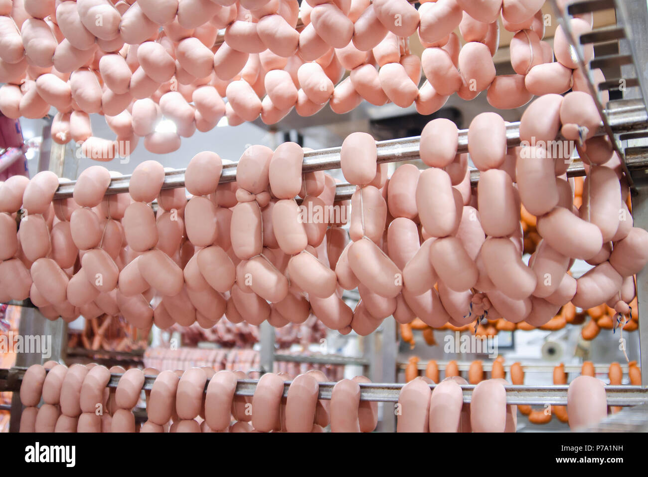 Sausage. Sausage production line. Sausage on the counter for the ...