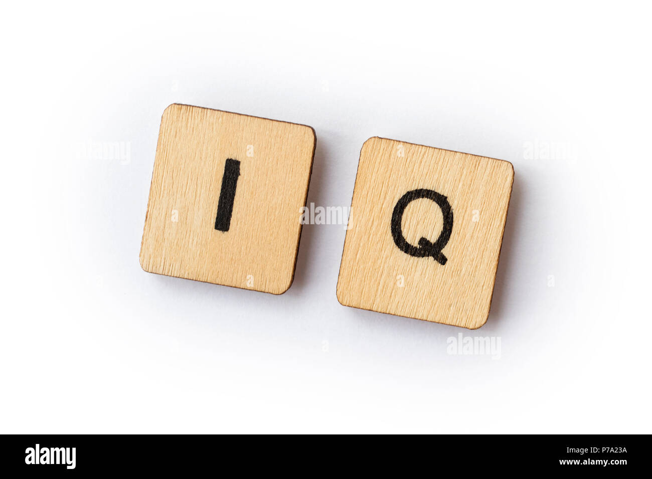 The abbreviation IQ - Intelligence Quotient, spelt with wooden letter ...