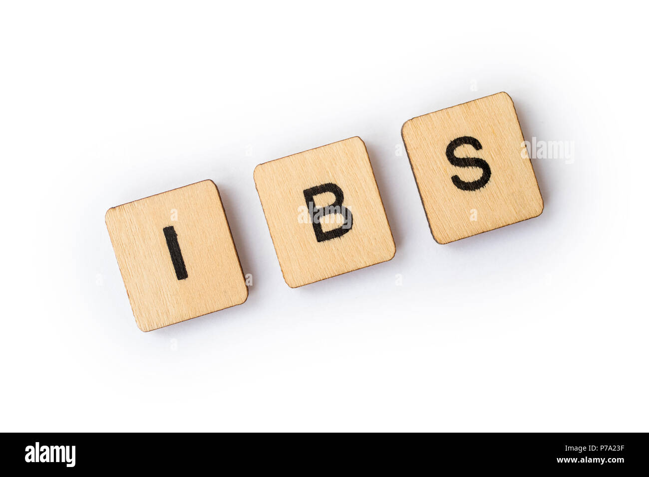 The abbreviation IBS - Irritable Bowel Syndrome, spelt with wooden ...