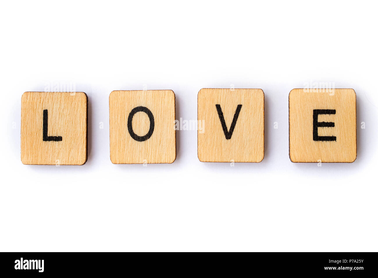 The word LOVE, spelt with wooden letter tiles Stock Photo - Alamy
