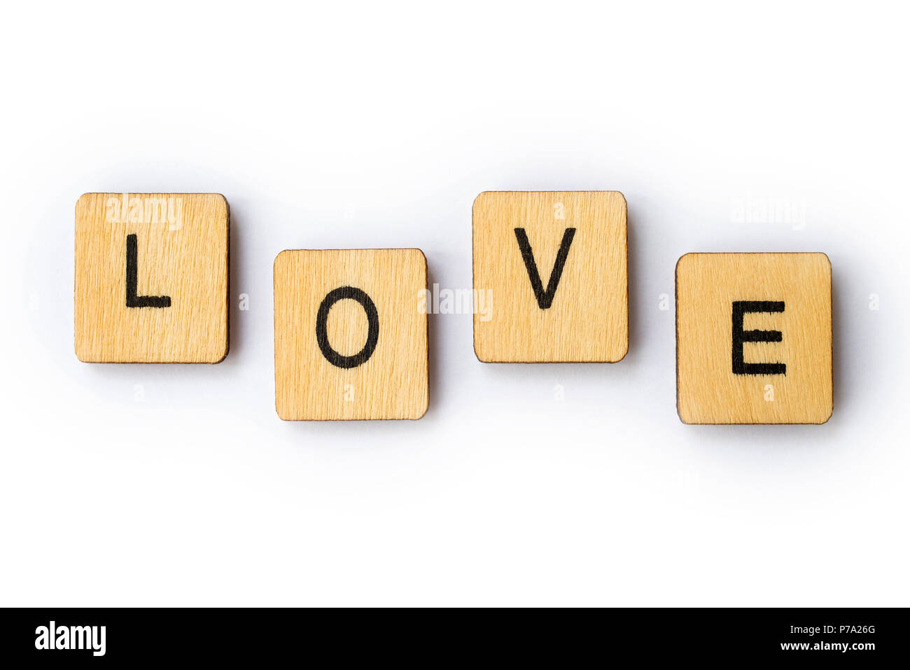 The word LOVE, spelt with wooden letter tiles Stock Photo - Alamy