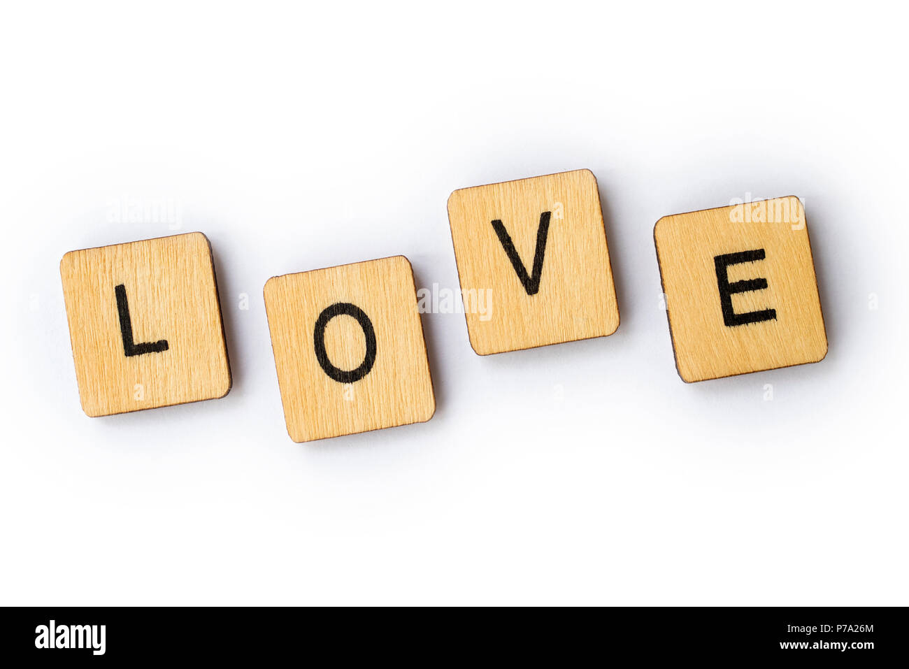 The word LOVE, spelt with wooden letter tiles Stock Photo - Alamy