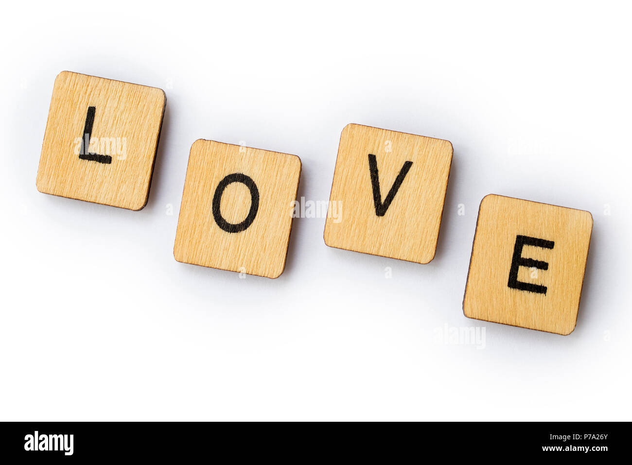 The word LOVE, spelt with wooden letter tiles Stock Photo - Alamy