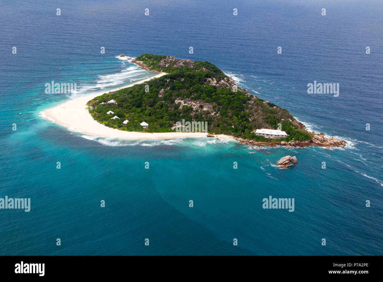 Aerial view of the small island Cousine, Seychelles in the Indian Ocean ...