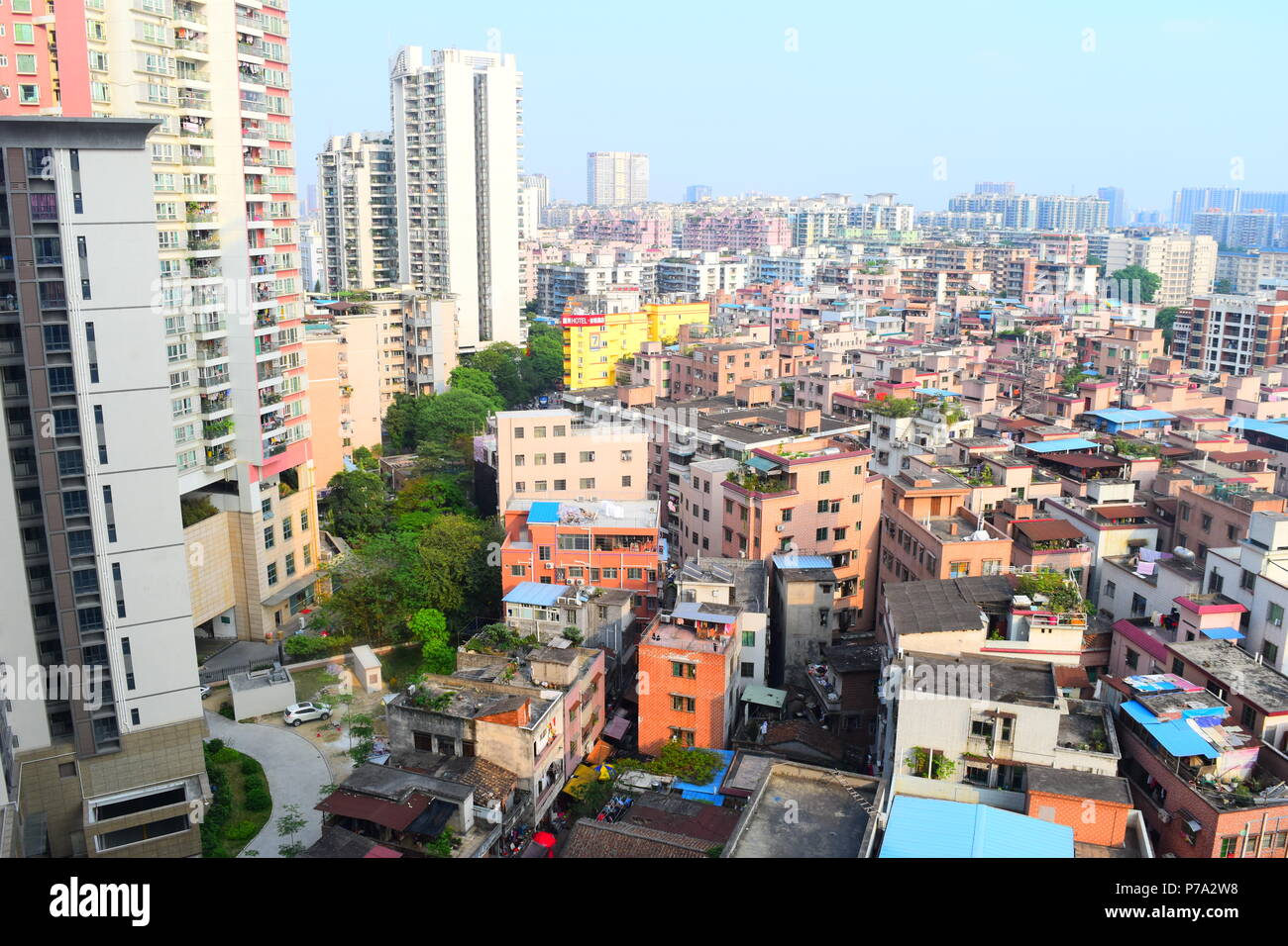 Dense city skyline over residential downtown district of Guangzhou ...