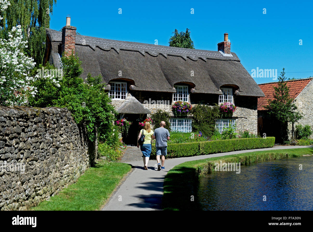 Thatched cottage & Thornton Beck, Thornton-le-Dale, North Yorkshire ...