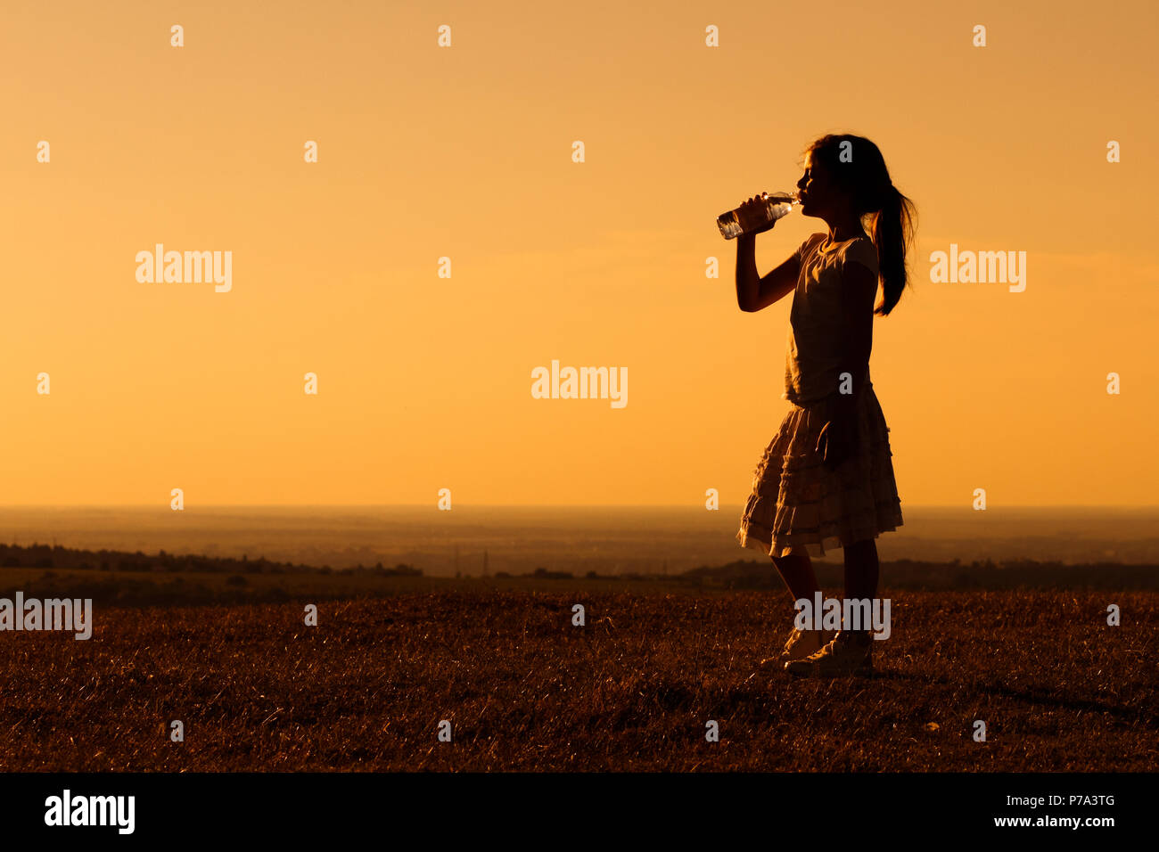 Refreshment for little girl Stock Photo - Alamy