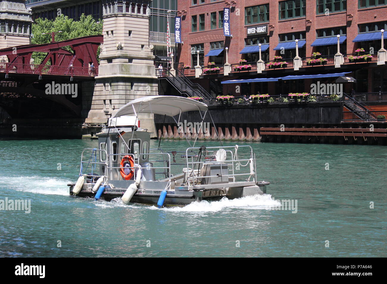 Garbage boat collects river debris hi-res stock photography and images ...